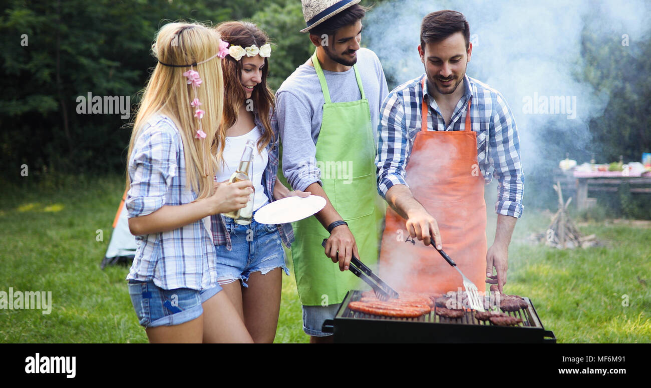 Friends talking bbq party hi-res stock photography and images - Alamy