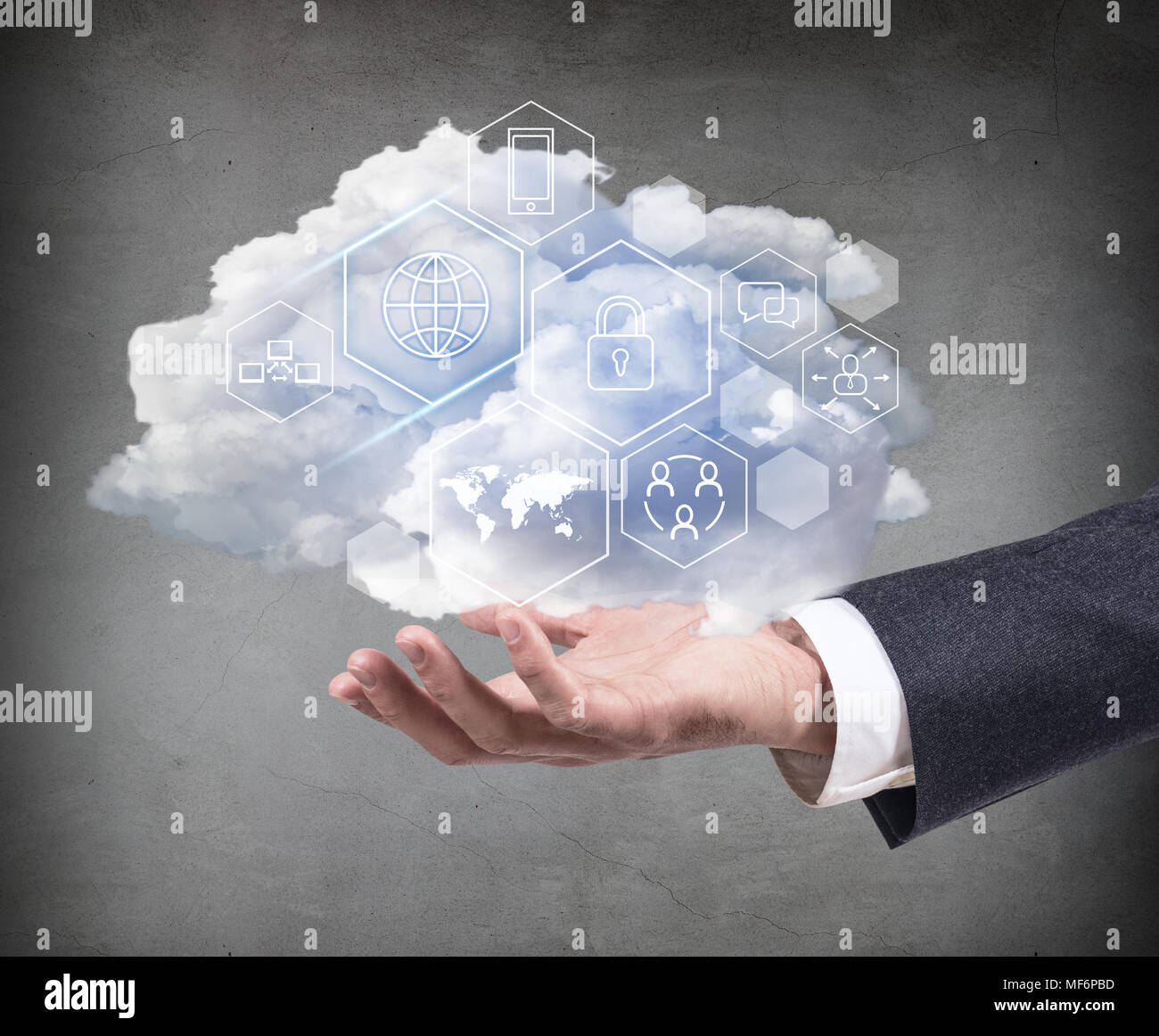 Hand holding cloud with different digital icons Stock Photo - Alamy