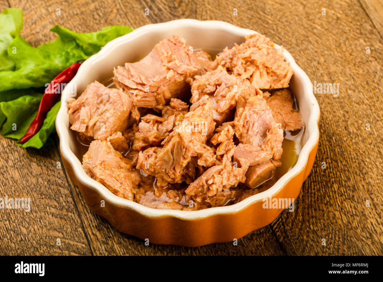 Canned tuna fish in the bowl ready for cooking Stock Photo - Alamy
