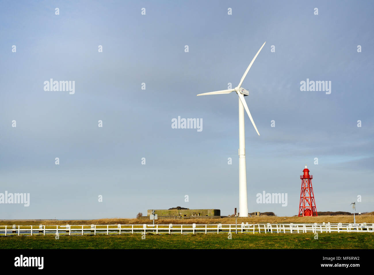 Wind turbine and lighthouse background with free space Stock Photo - Alamy