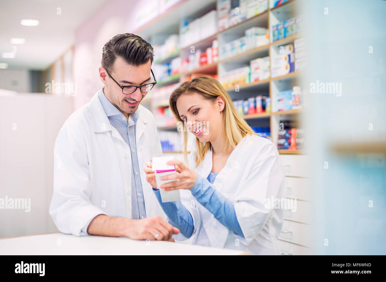 Two female chemists talking in hi-res stock photography and images - Alamy