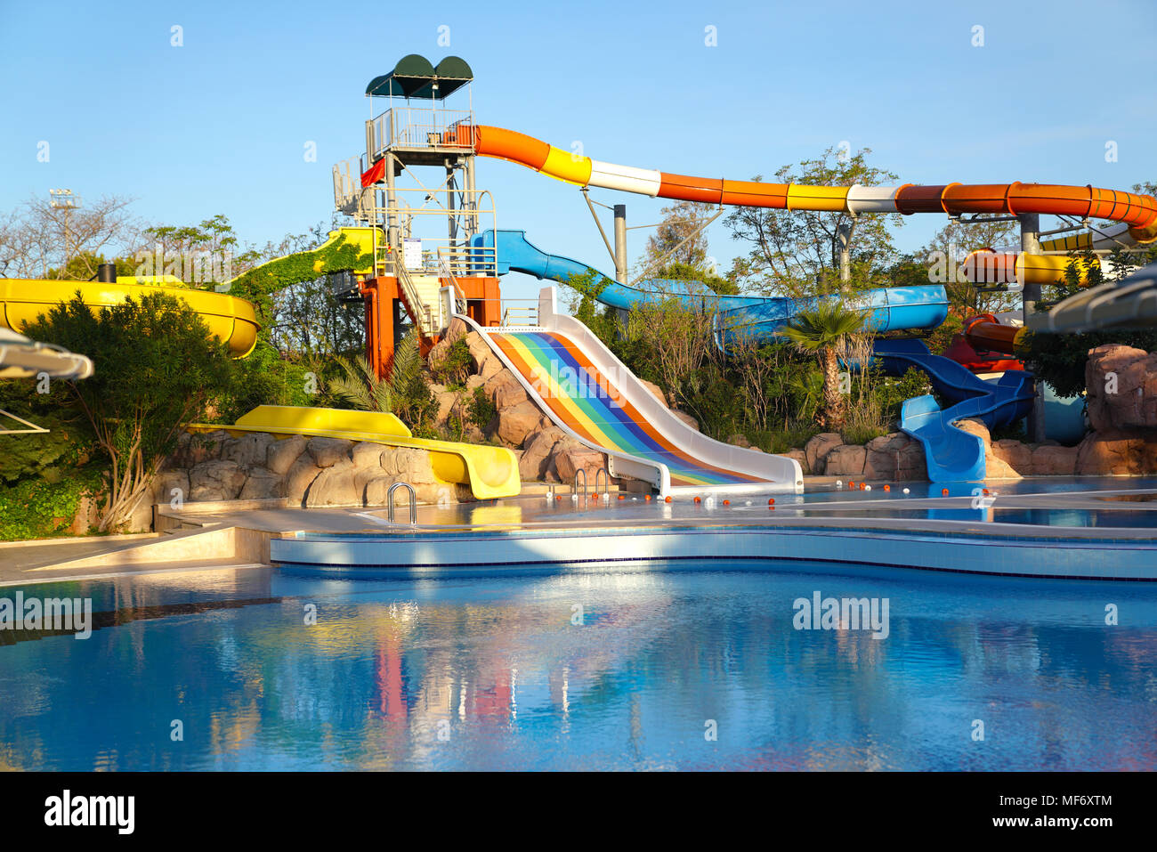 Water park reflection in swimming pool Stock Photo - Alamy