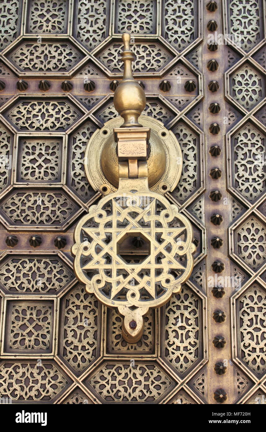Typical arab style doorknob in a wood door Stock Photo - Alamy