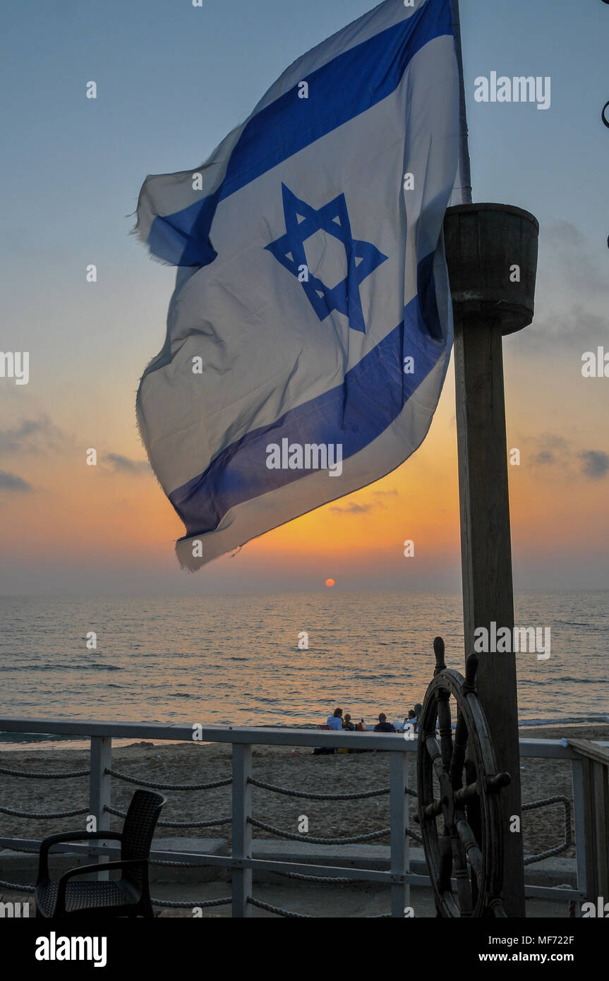 Israeli Flag blue sky at sunset Stock Photo - Alamy