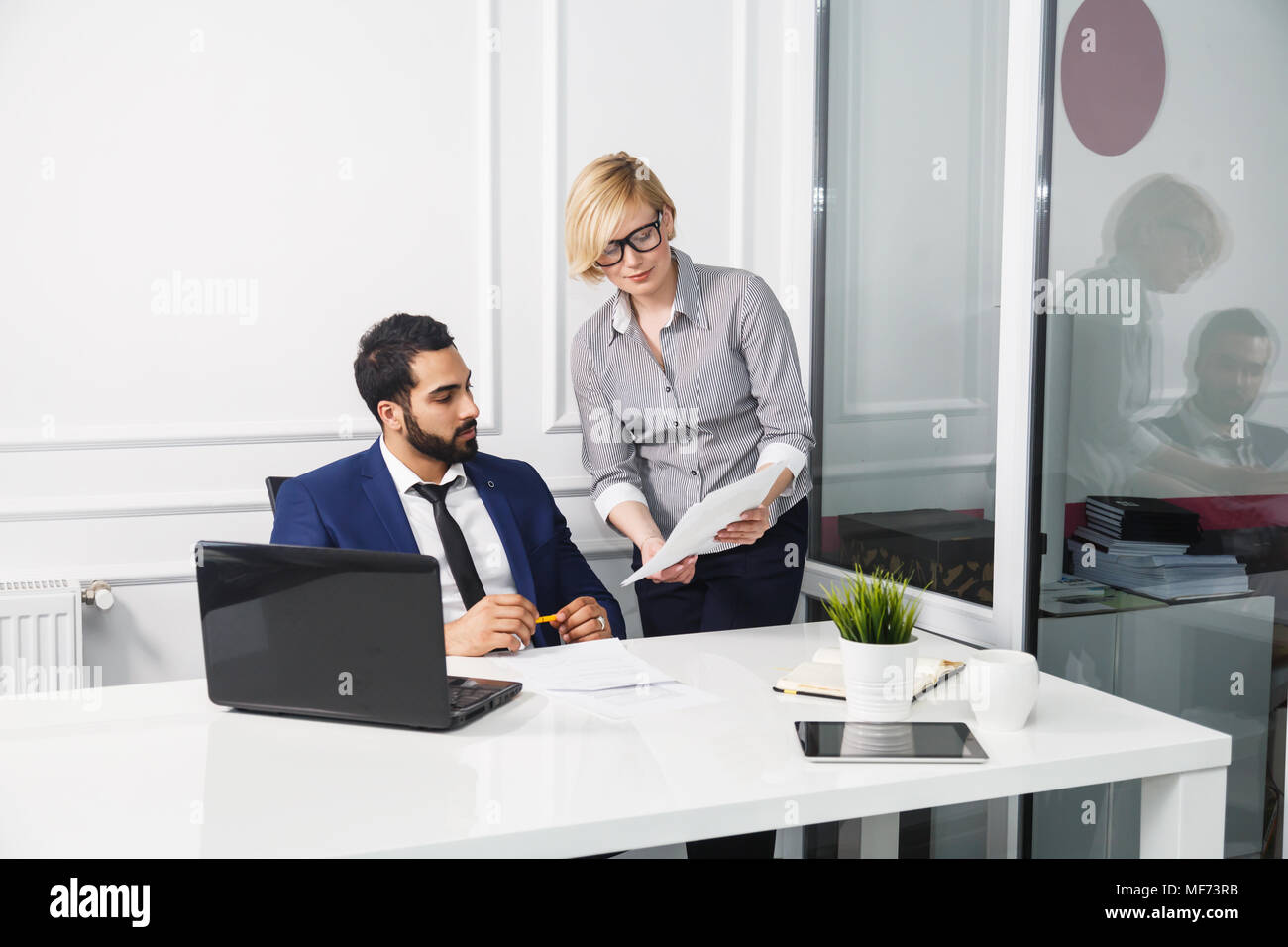 Reporting a Work Stock Photo - Alamy