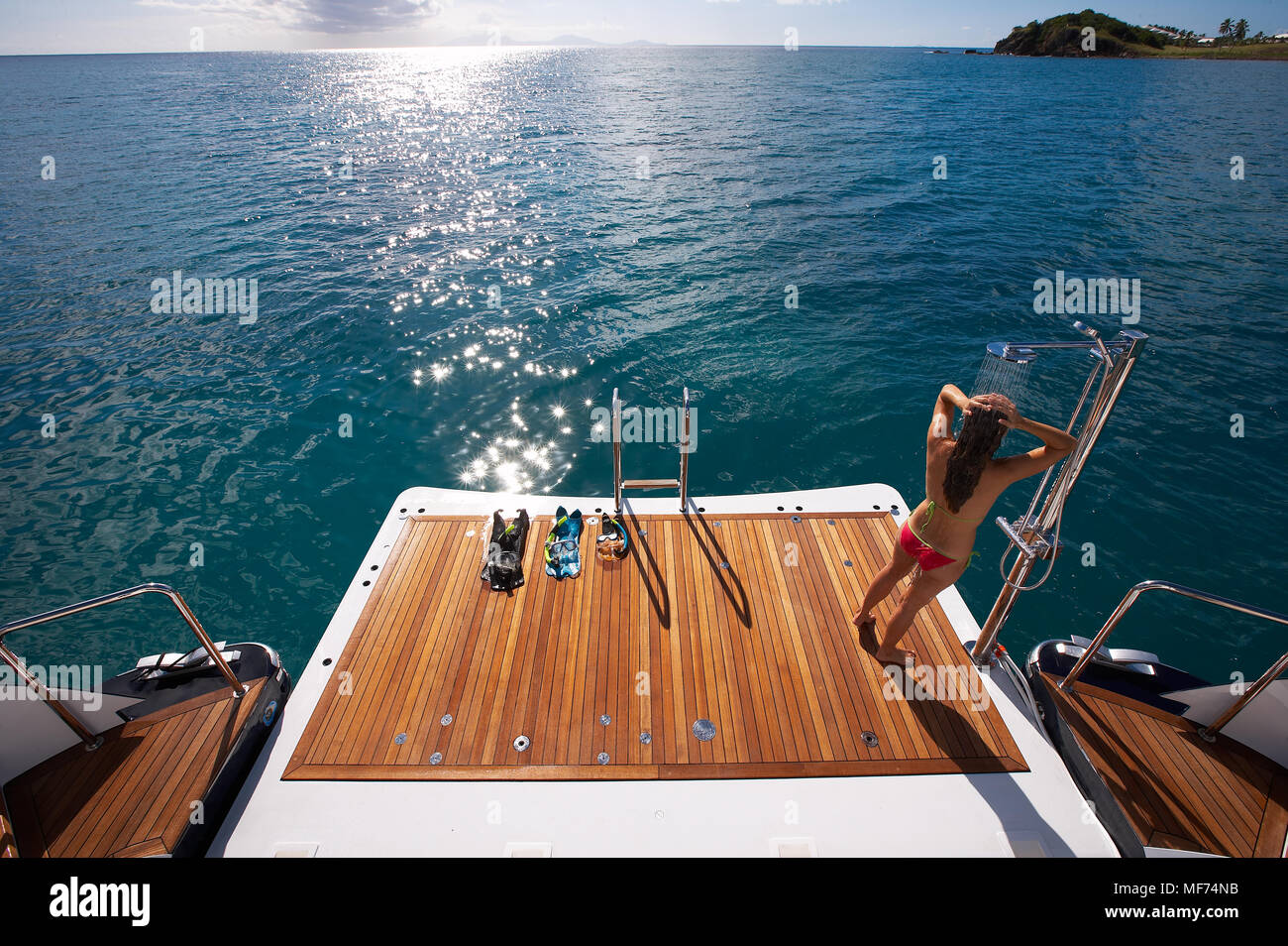 Yacht swimming platform with shower Stock Photo - Alamy