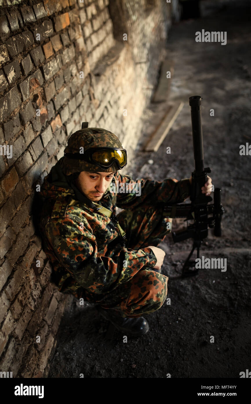 A thoughtful soldier, resting from a military operation Location of ...
