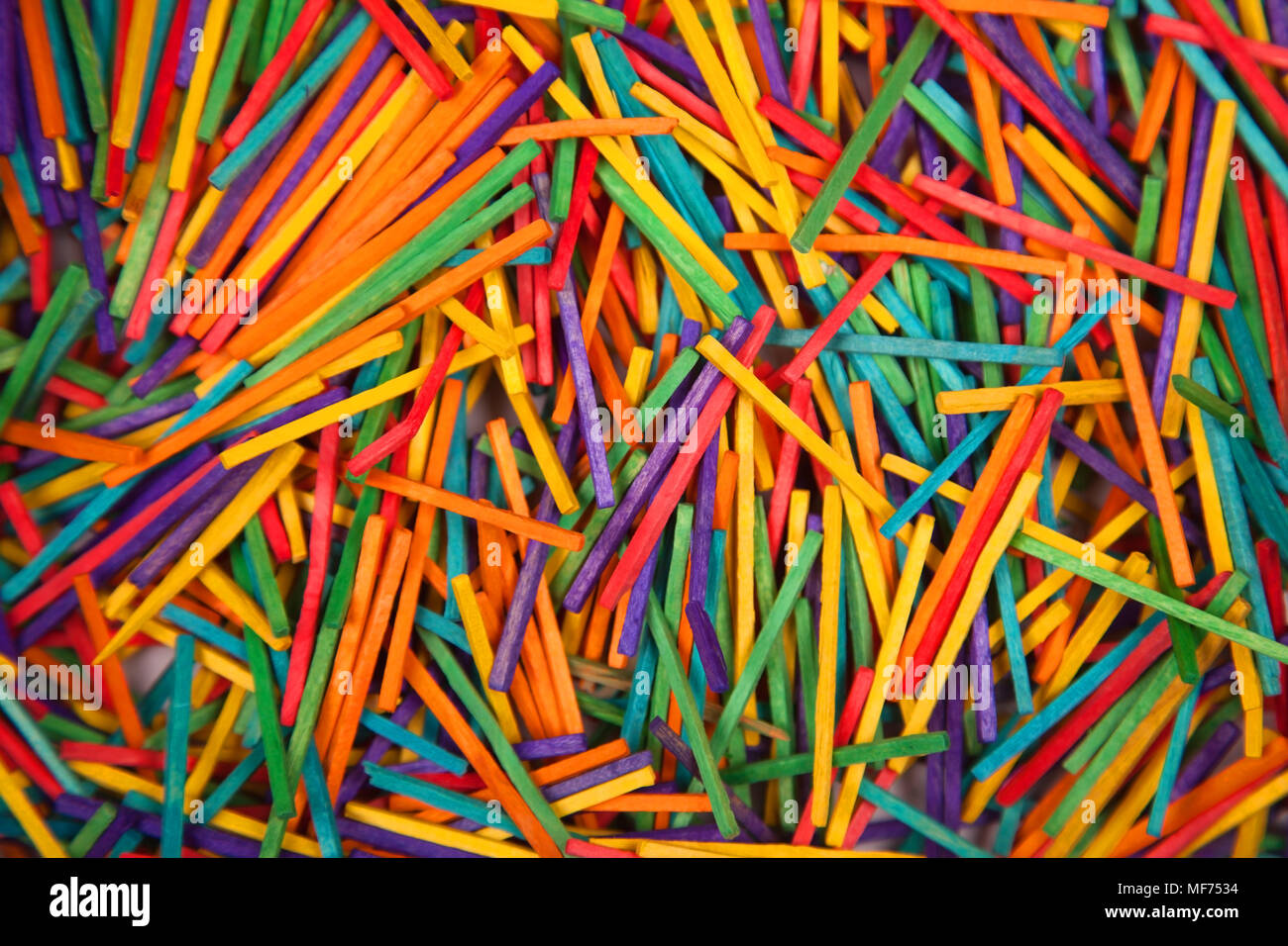 Colored wooden sticks, color background for creativity Stock Photo - Alamy
