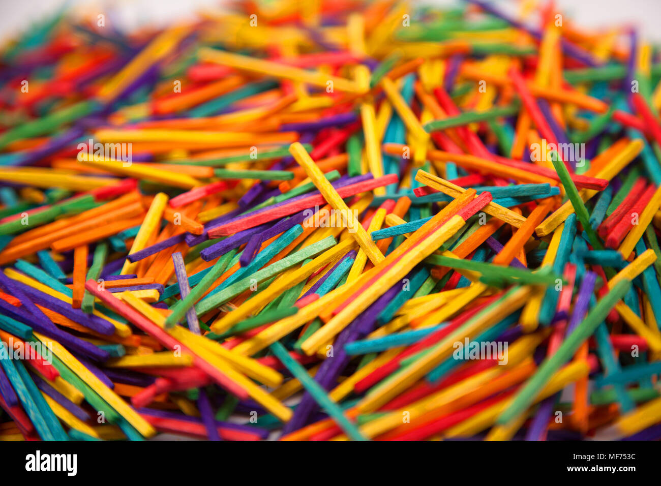 Colored wooden sticks Stock Photo - Alamy