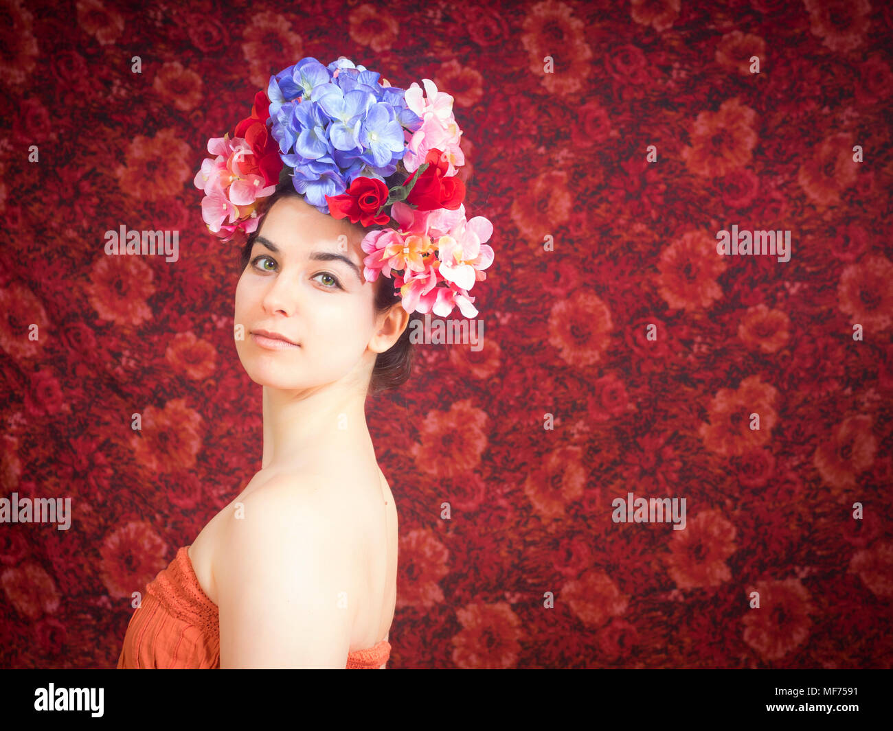 Woman wearing flowers on head Stock Photo - Alamy