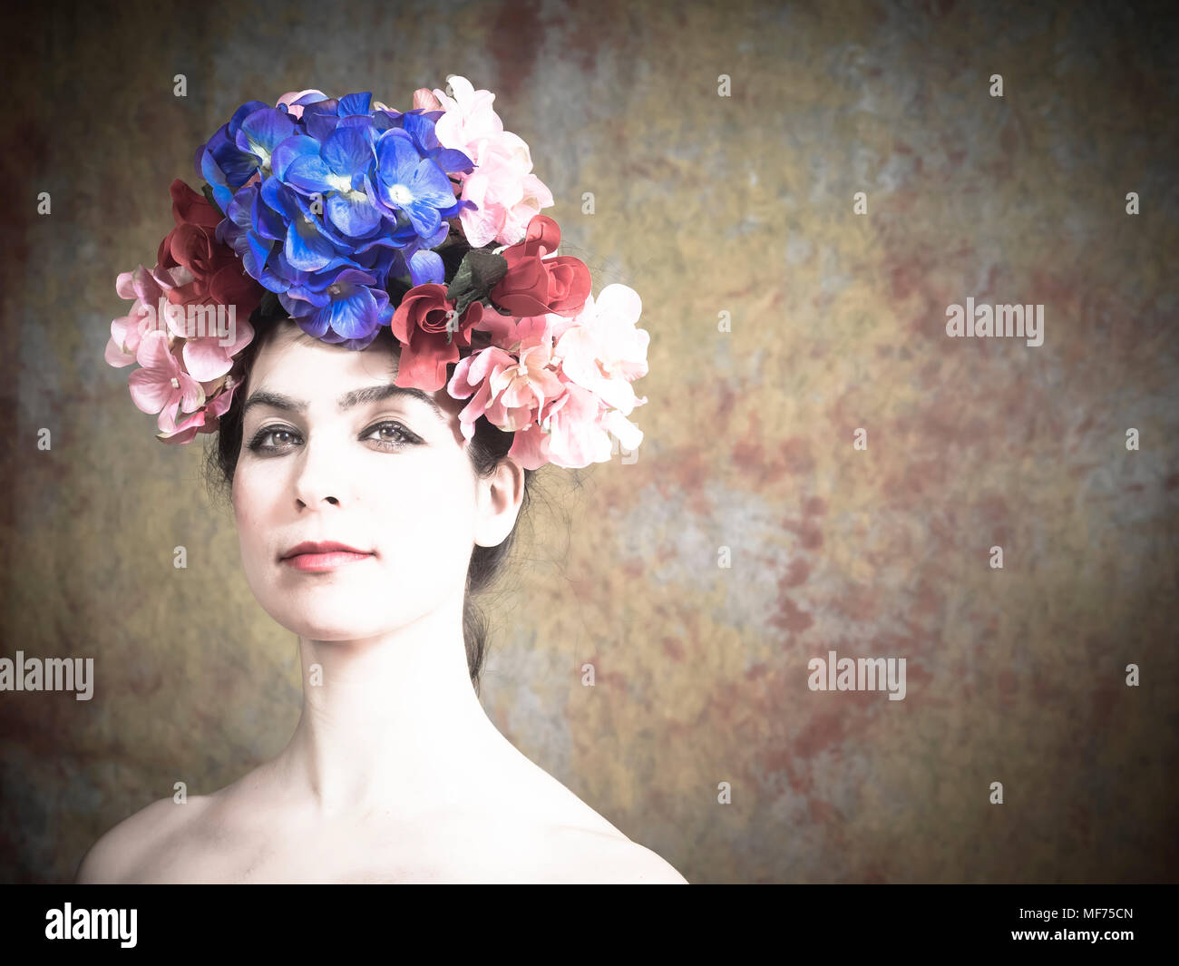 Woman wearing flowers on head Stock Photo - Alamy