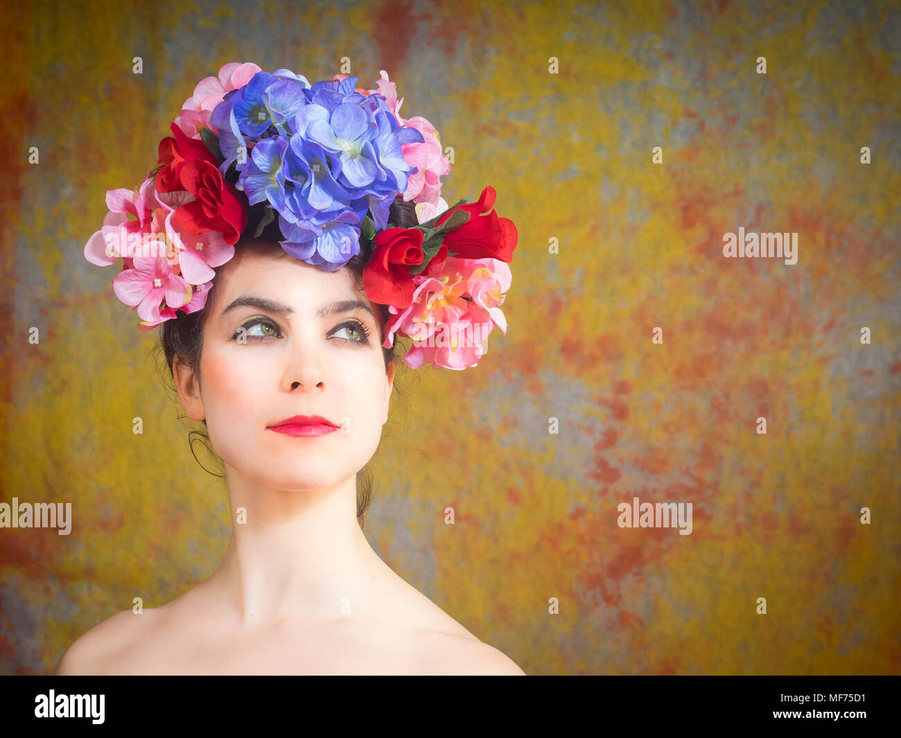 Woman wearing flowers on head Stock Photo - Alamy