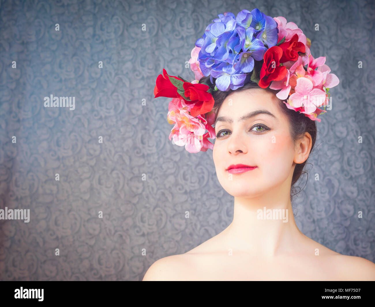 Woman wearing flowers on head Stock Photo - Alamy