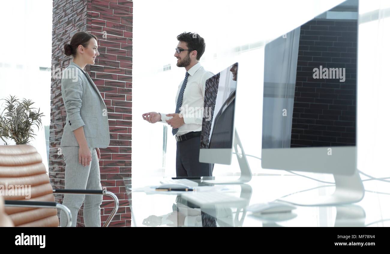 employees are talking in modern office Stock Photo - Alamy
