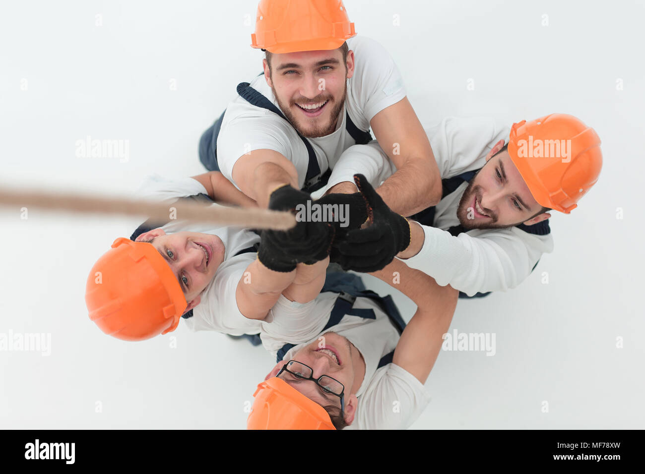 Construction worker pulling rope hi-res stock photography and images ...