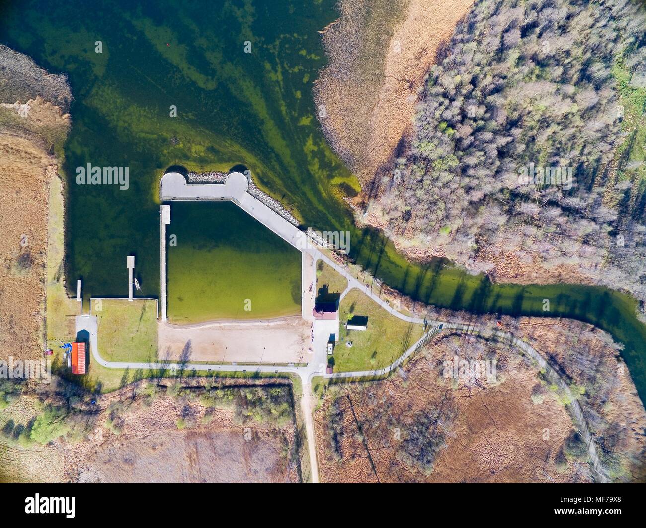 Aerial view of the beach on Mamry lake shore by Wegorapa river estuary ...