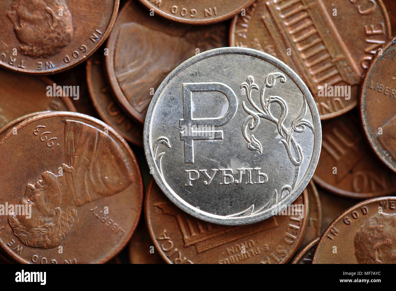 Russian ruble coin and US cent coins Stock Photo - Alamy