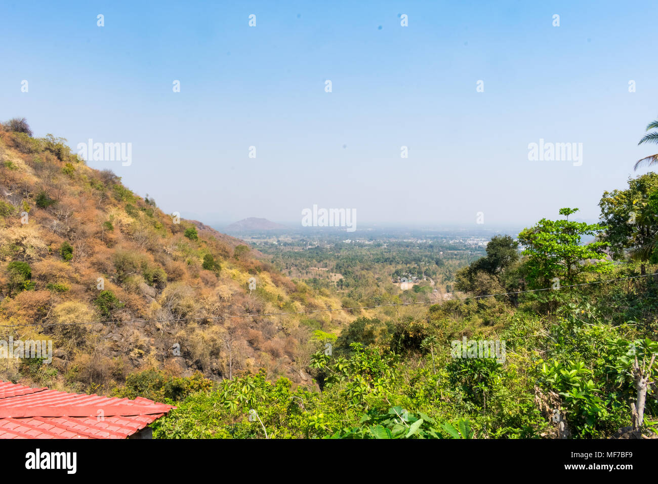 greenery mountain looking beautiful in summer season with village view ...