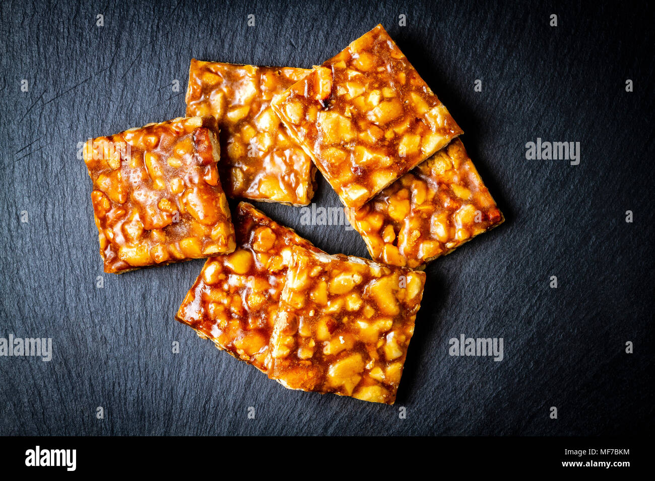 Pe de moleque (a kind of peanut brittle), a traditional Brazilian sweet ...