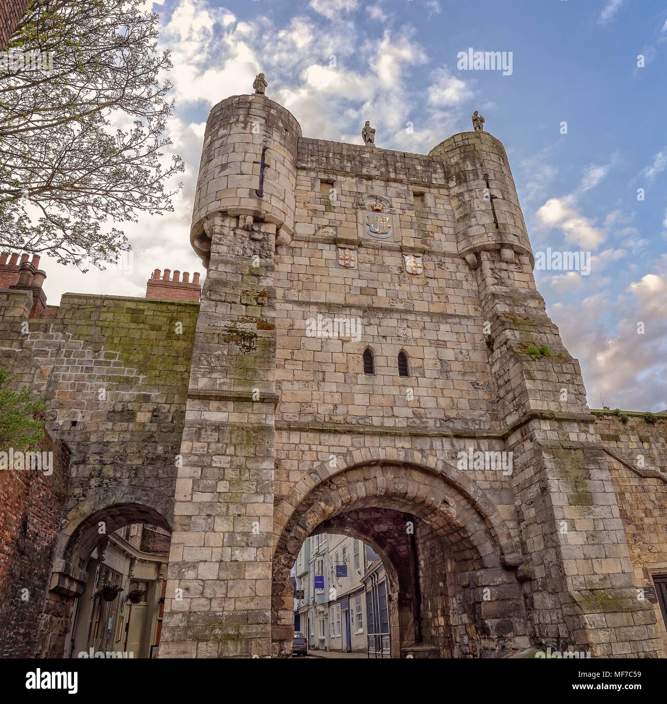 Ancient gateway through York city walls, underneath a blue sky Stock ...
