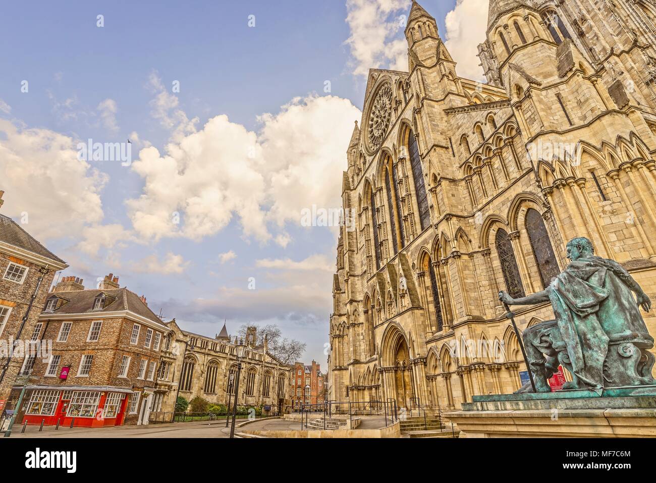 The ornate stonework of York Minster's South entrance with a statue of ...