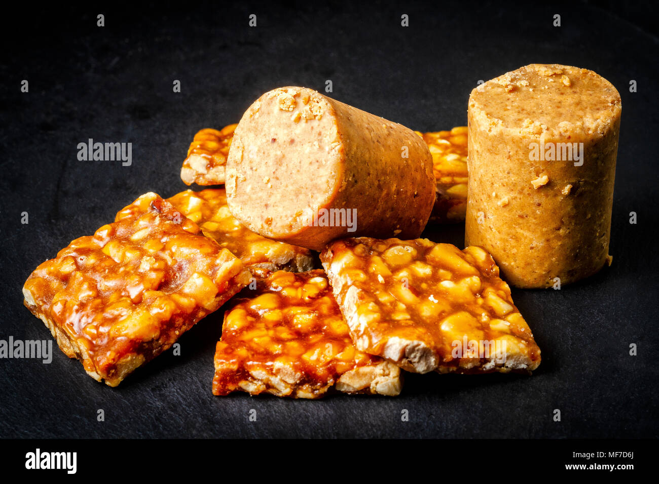 Pe de moleque (a kind of peanut brittle) and pacoca, traditional ...