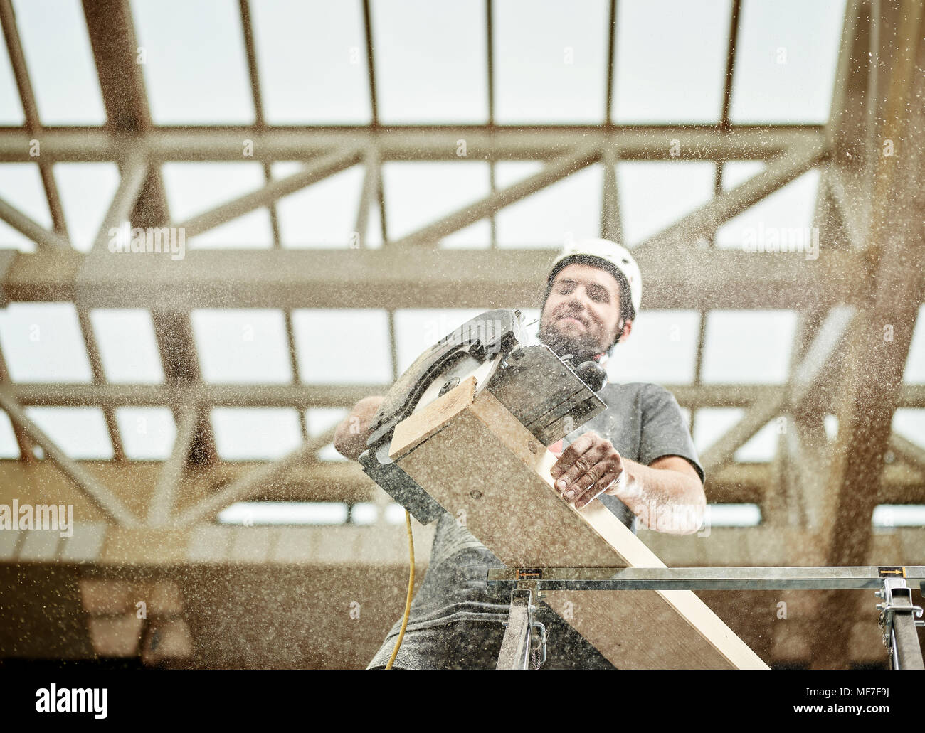 Worker Sawing Wood High Resolution Stock Photography and Images - Alamy