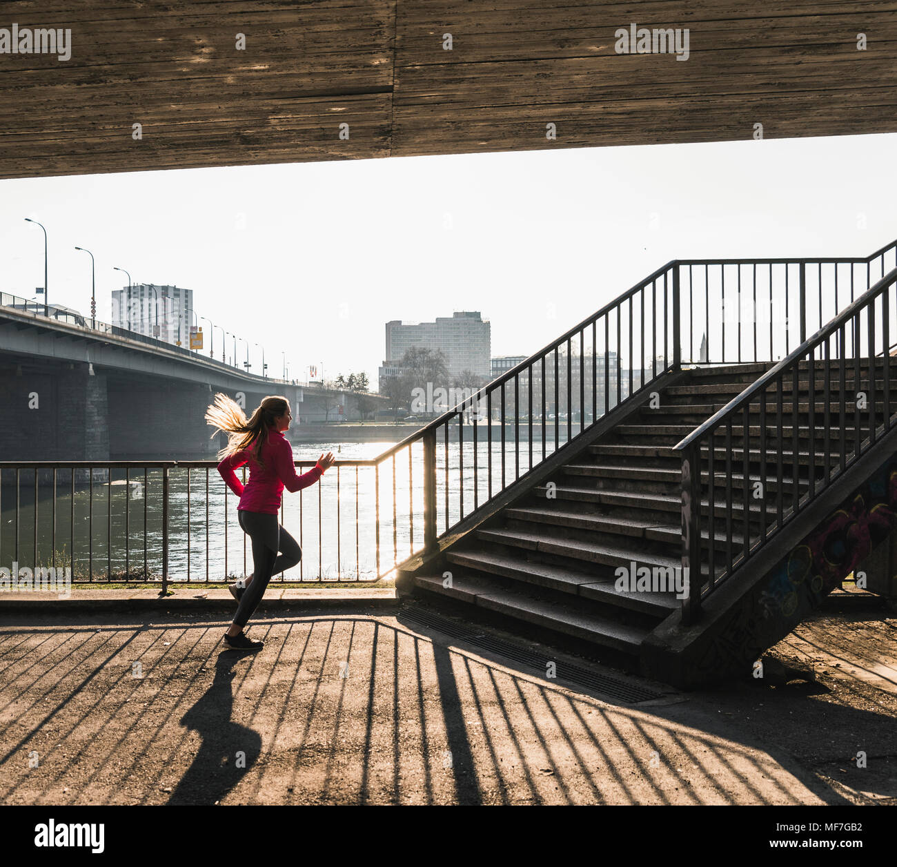 Woman runner stairs hi-res stock photography and images - Alamy