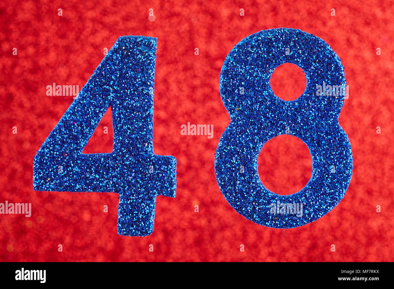 Number forty-eight blue color over a red background. Anniversary ...