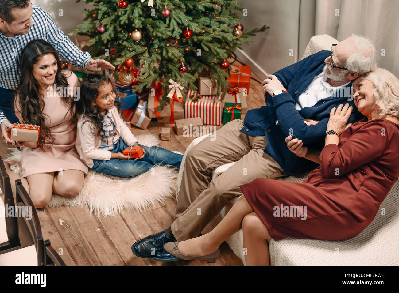 family spending time on christmas Stock Photo - Alamy