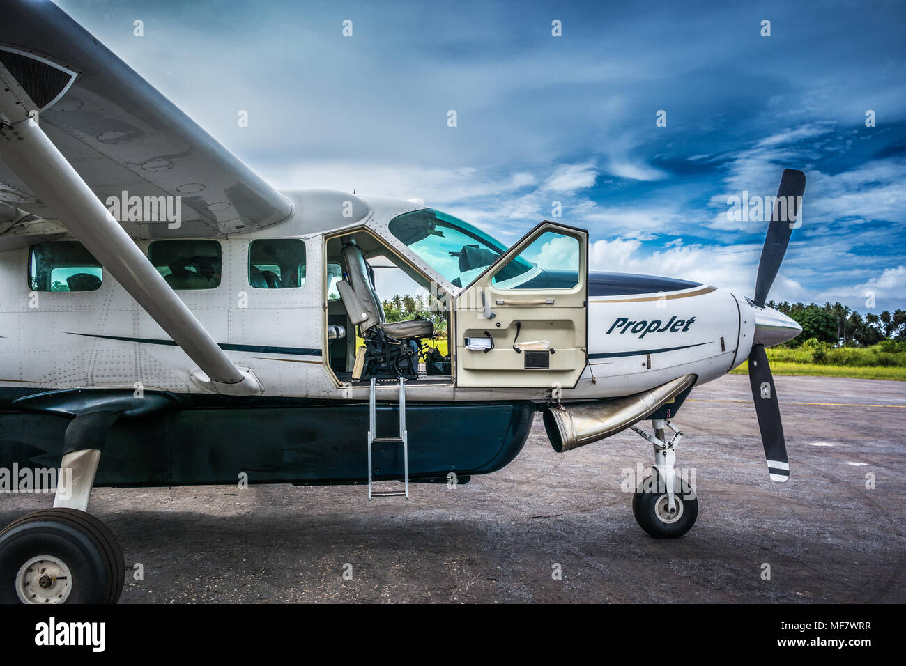 Light plane parked on tarmac Stock Photo - Alamy
