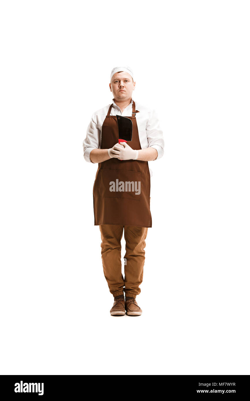 Smiling butcher posing with a cleaver isolated on white background ...