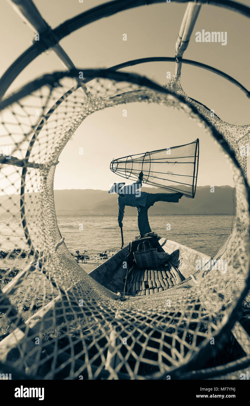 Fisherman lifting net with foot hi-res stock photography and images - Alamy