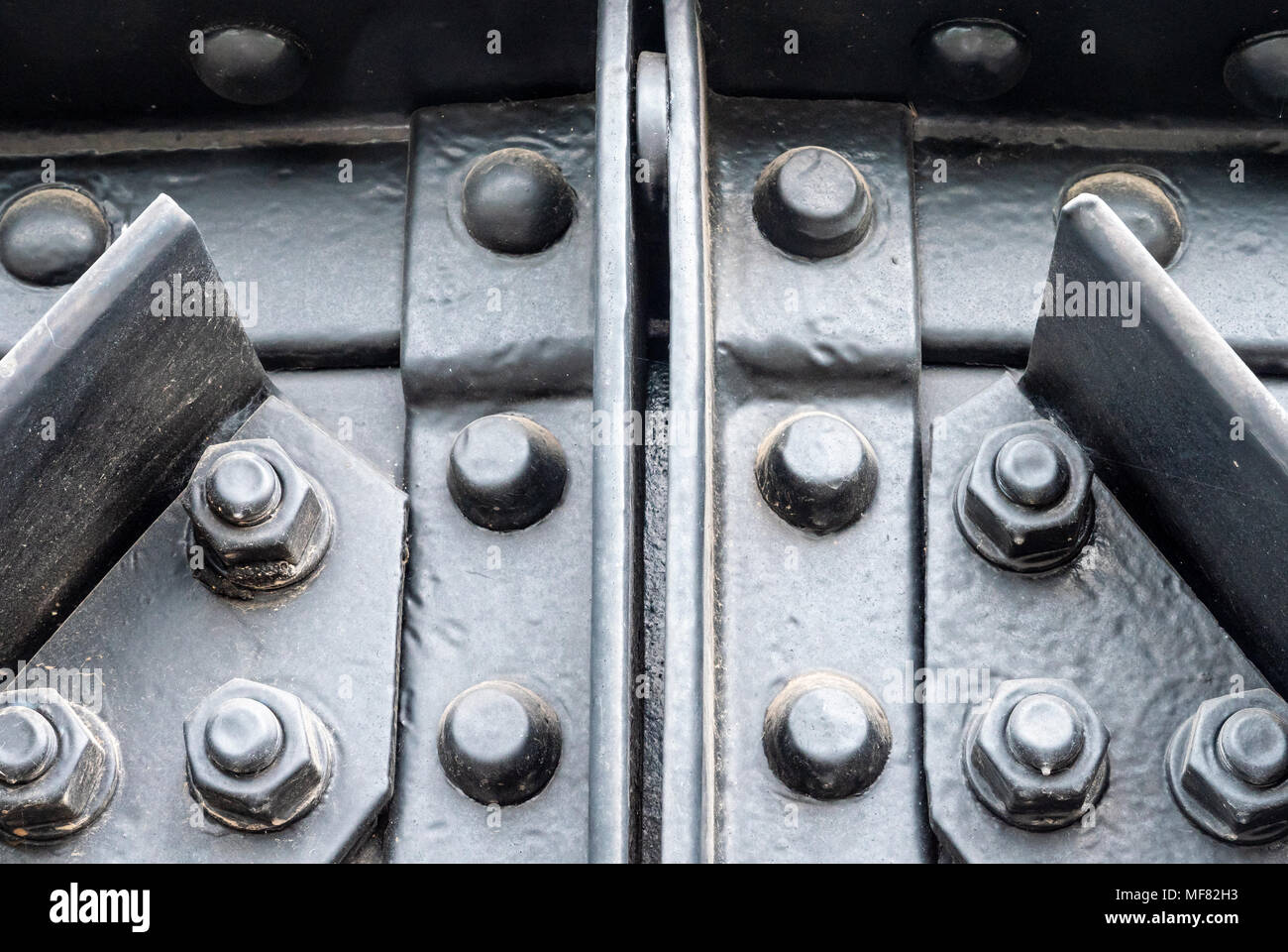 Closeup of the steel structure with the rivet in the old railway bridge ...