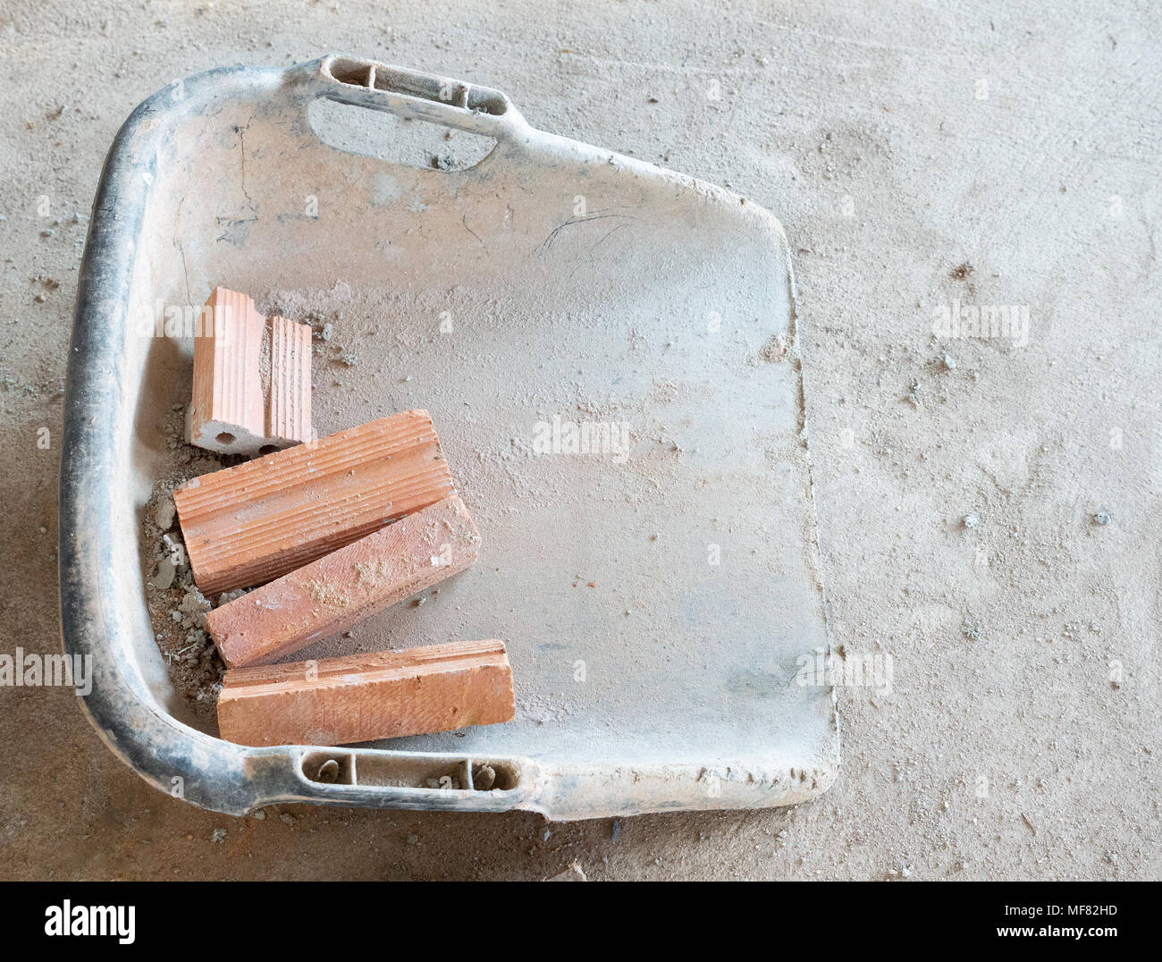 Old plastic rod which contain the small brick for build the modern ...