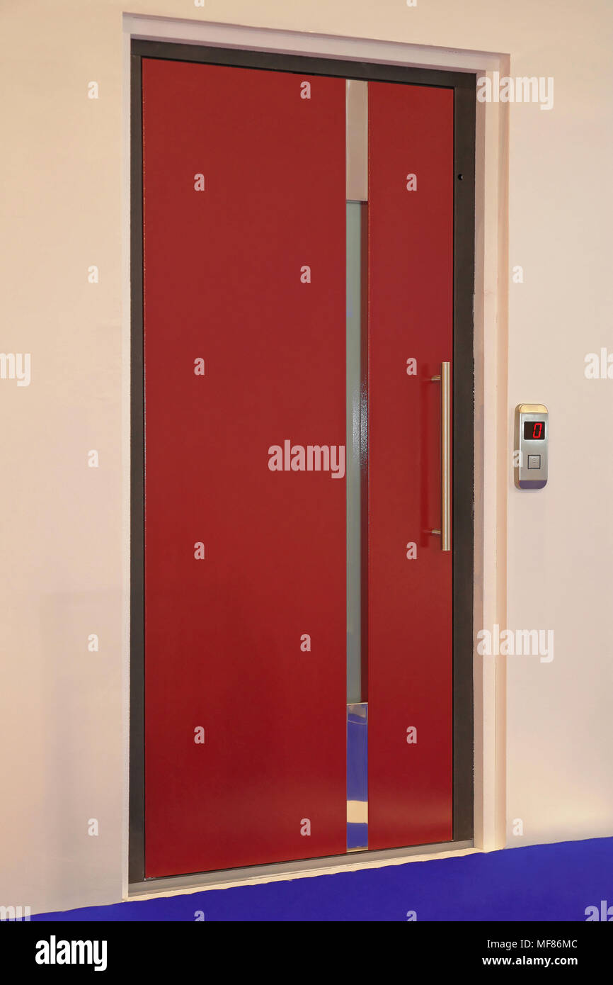 Modern Red Door for Lift Elevator Entrance Stock Photo - Alamy