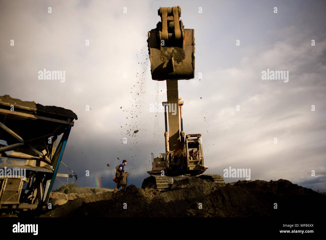 Employees mine gold at Stuart Schmidt Gold Mining near Dawson City ...
