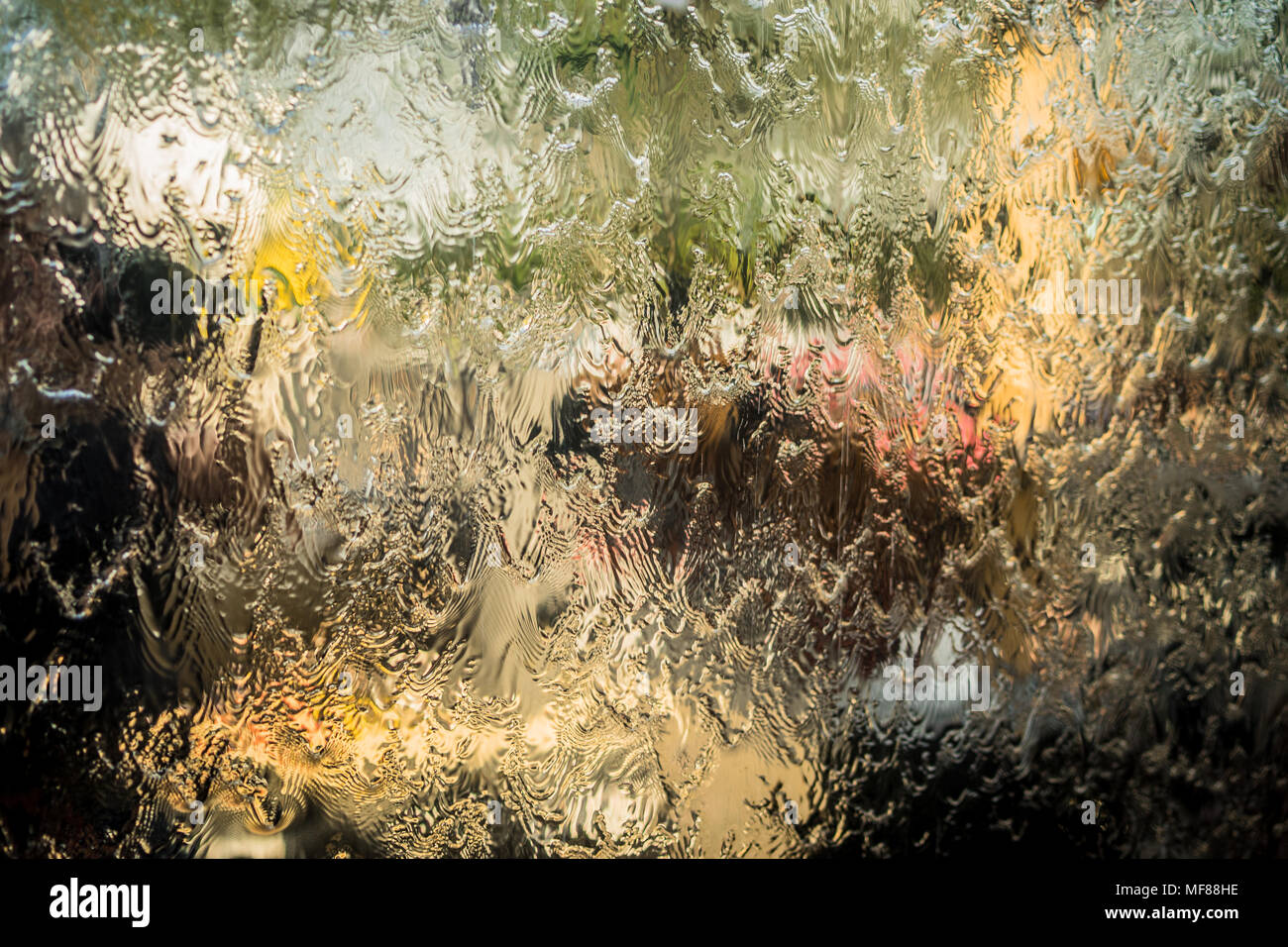 Abstract background from water running down a glass mirror Stock Photo ...