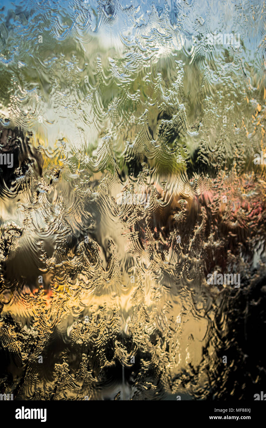 Abstract background from water running down a glass mirror Stock Photo ...