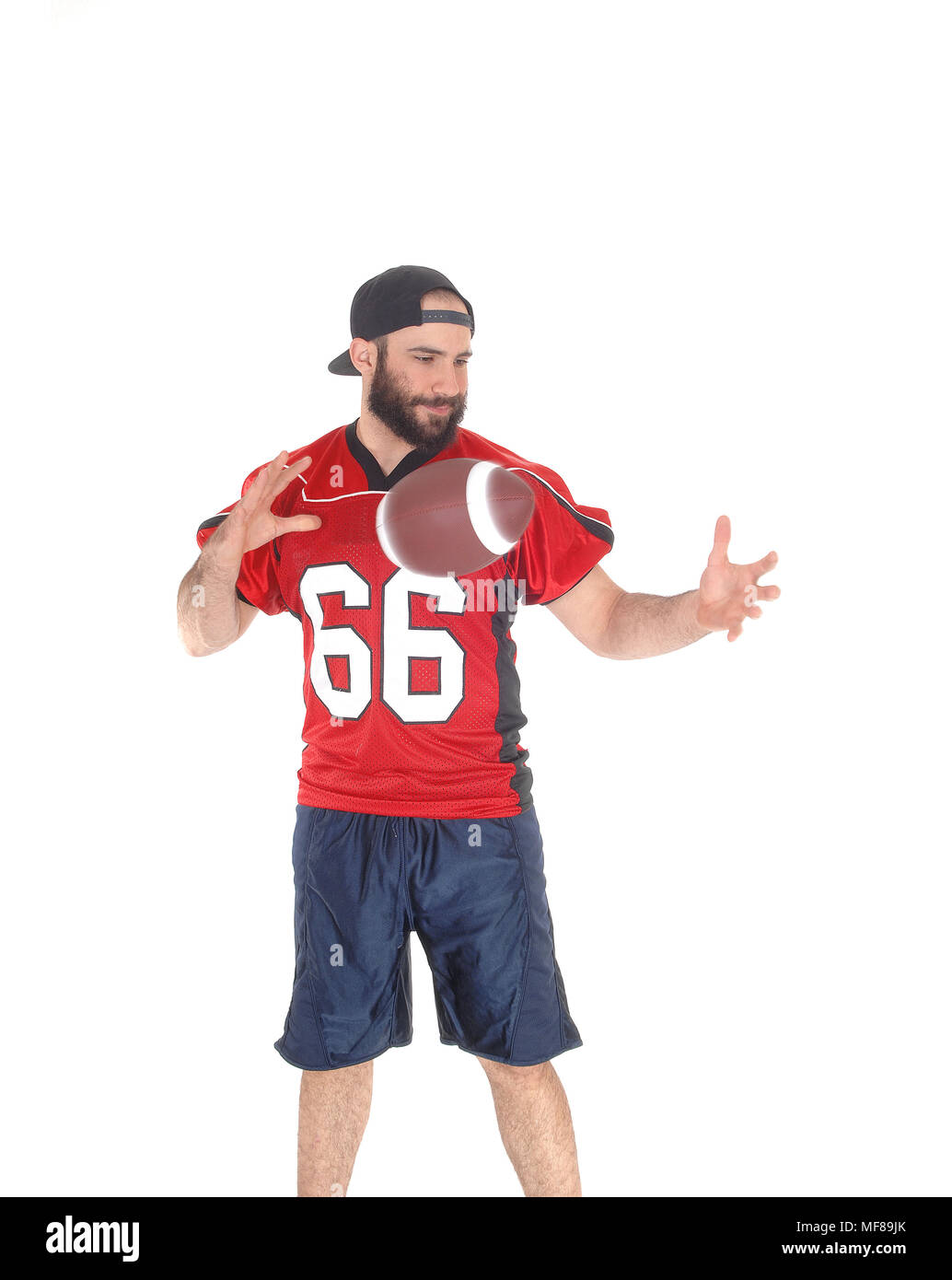American football player playing throwing the ball in his hand hi-res ...