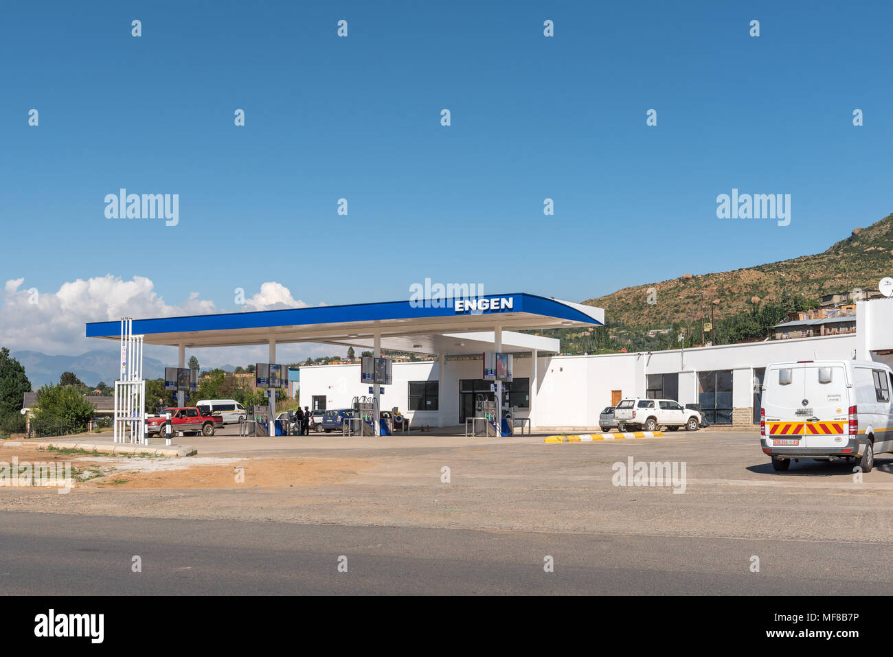 QWAQWA, SOUTH AFRICA - MARCH 14, 2018: A street scene with gas station ...