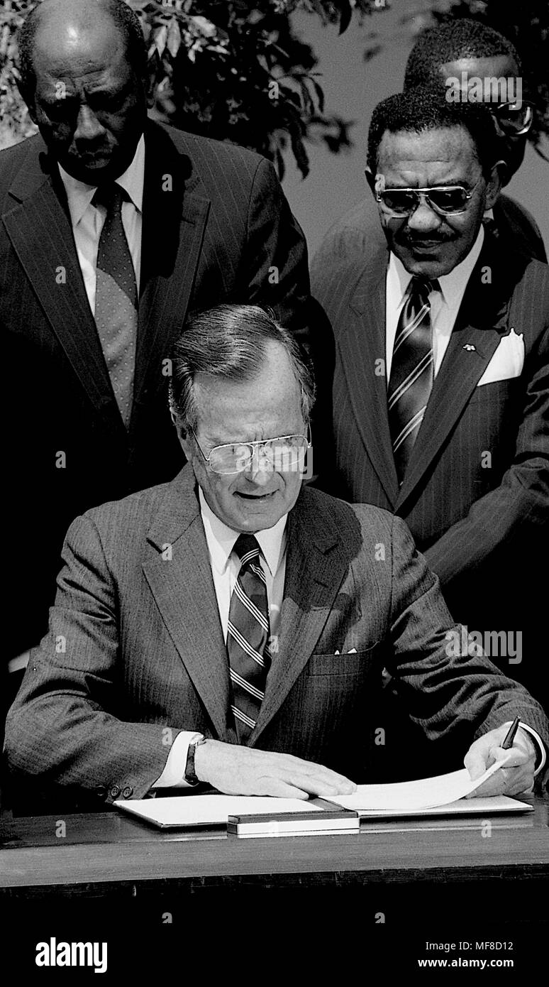 Washington, DC., USA, April 28, 1989 President George H.W. Bush signing ...