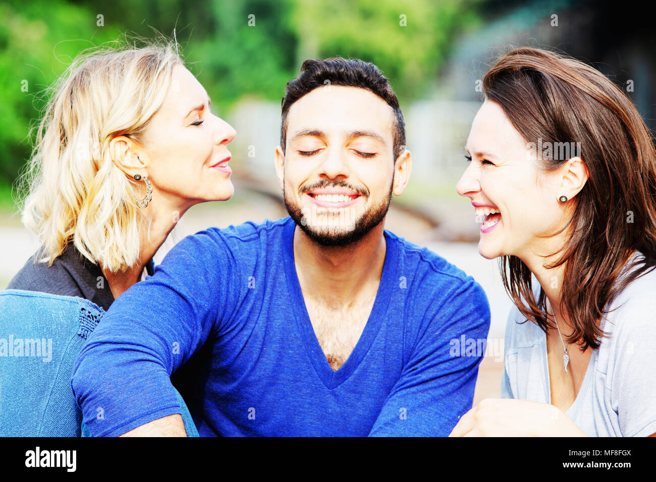 Two young attractive women kissing hi-res stock photography and images ...