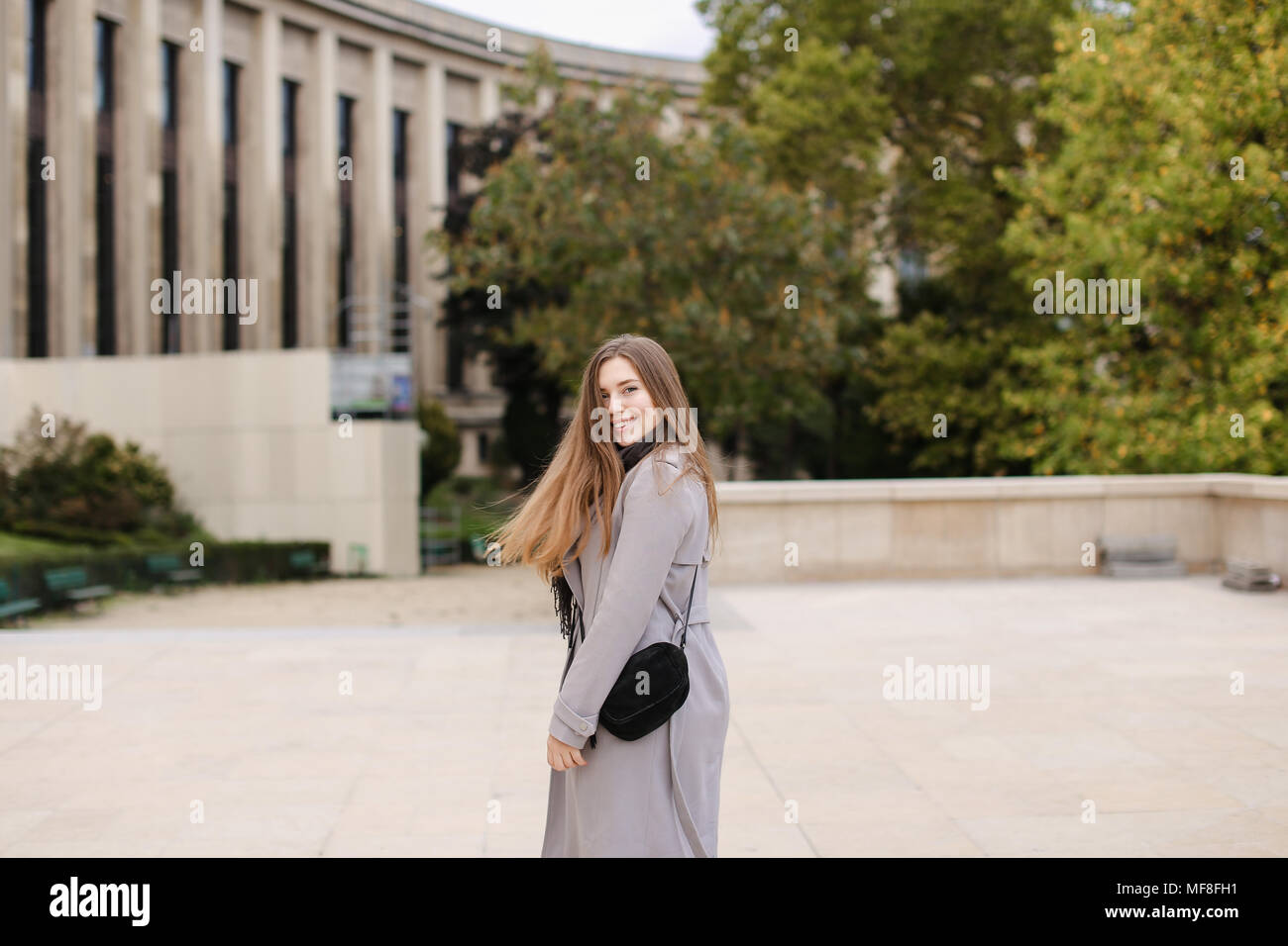 Girl in grey coat hi-res stock photography and images - Alamy