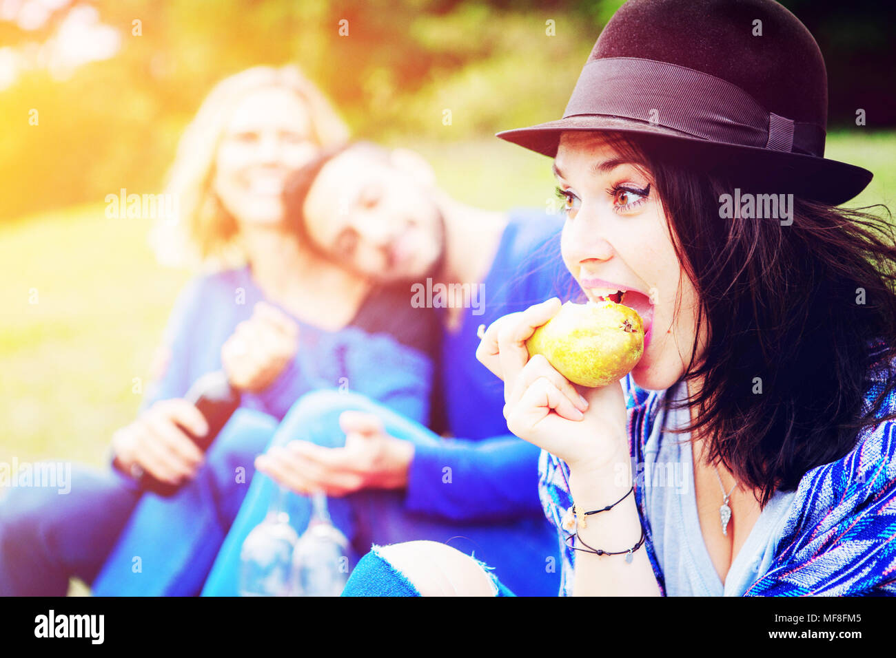 Woman eating pear hi-res stock photography and images - Alamy