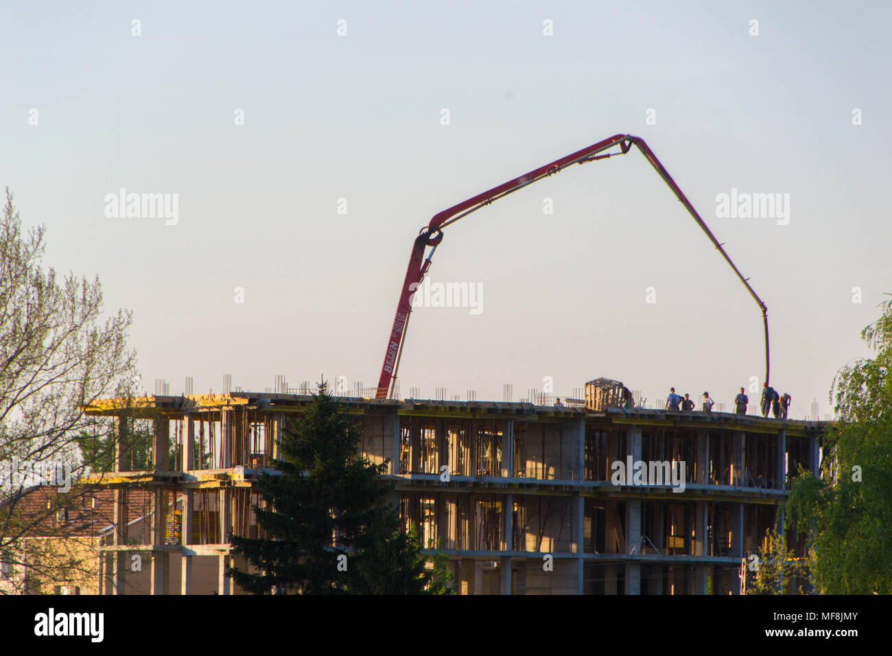 Concrete Pouring During Commercial Concreting Floors Of Buildings In