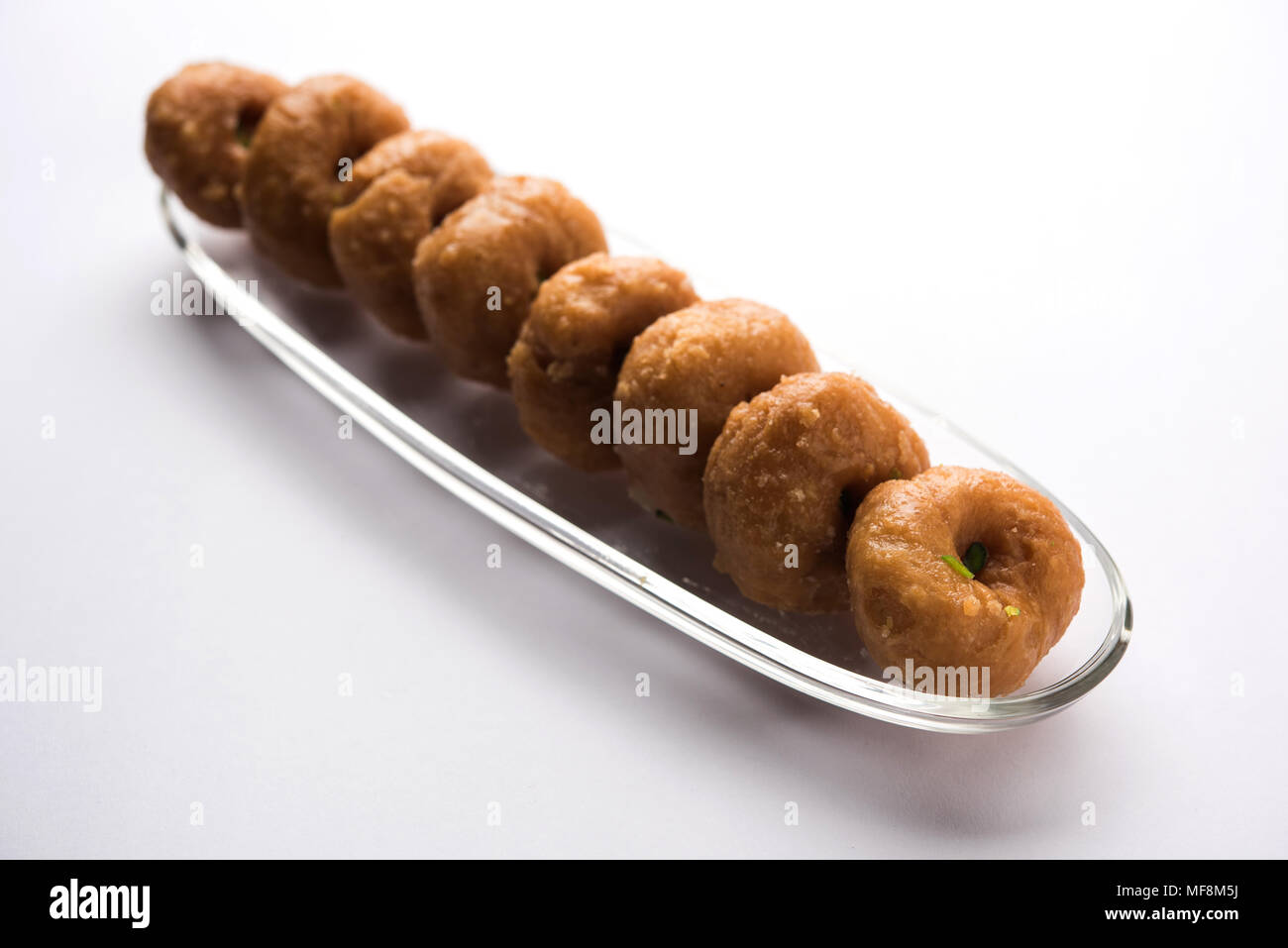 Balushahi is a traditional dessert from the Indian subcontinent served ...
