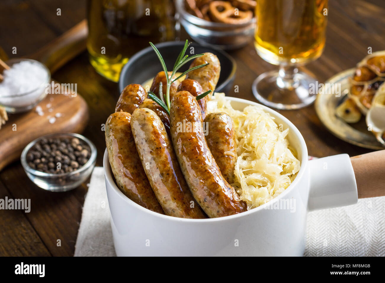 Traditional German Sausages with Cabbage Salad, Mustard and Beer ...