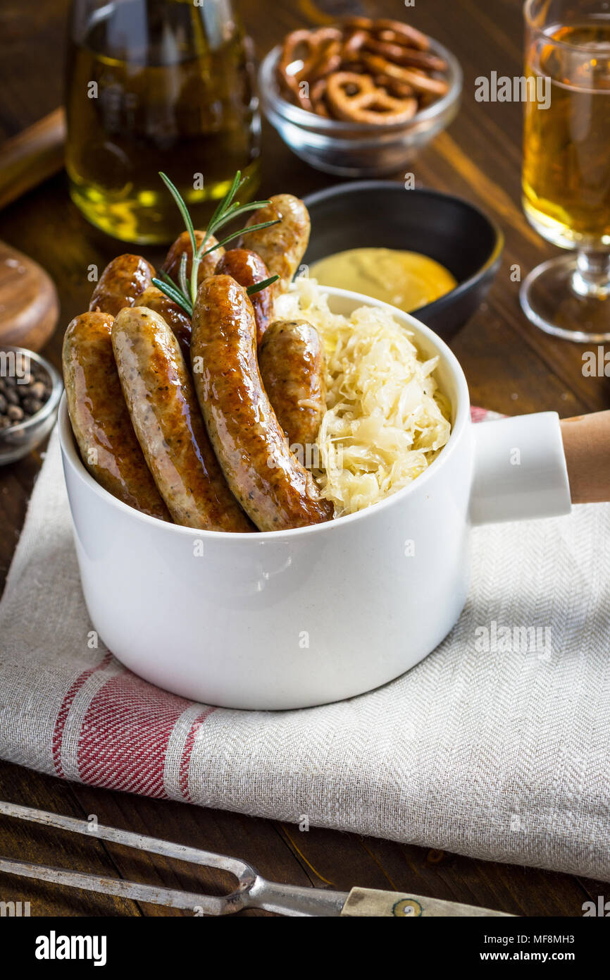 Traditional German Sausages with Cabbage Salad, Mustard and Beer ...