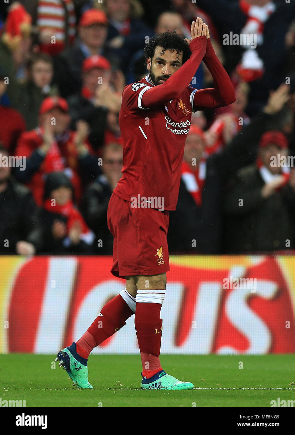 Liverpool's Mohamed Salah celebrates scoring his side's first goal of ...